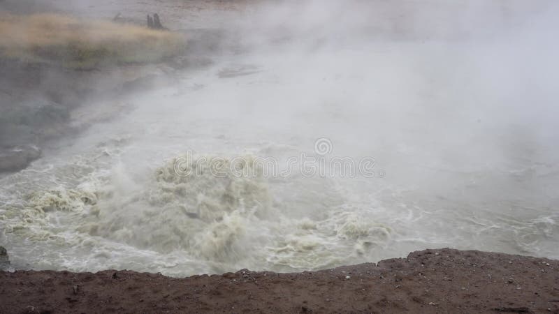 Slowly Zoom Out of Boiling Geothermal Pool with Steam Stock Video ...