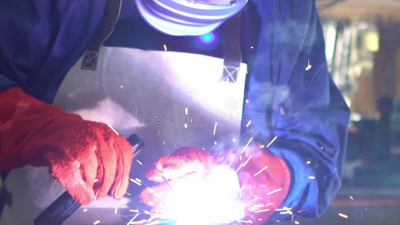 Skillful Metal Worker Working with Plasma Welding Machine in Shipyard ...