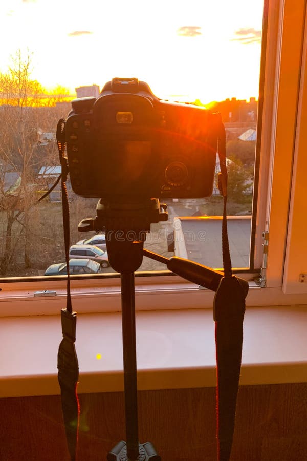 SLR Camera on Sunset Background Stock Photo - Image of tripod, film ...