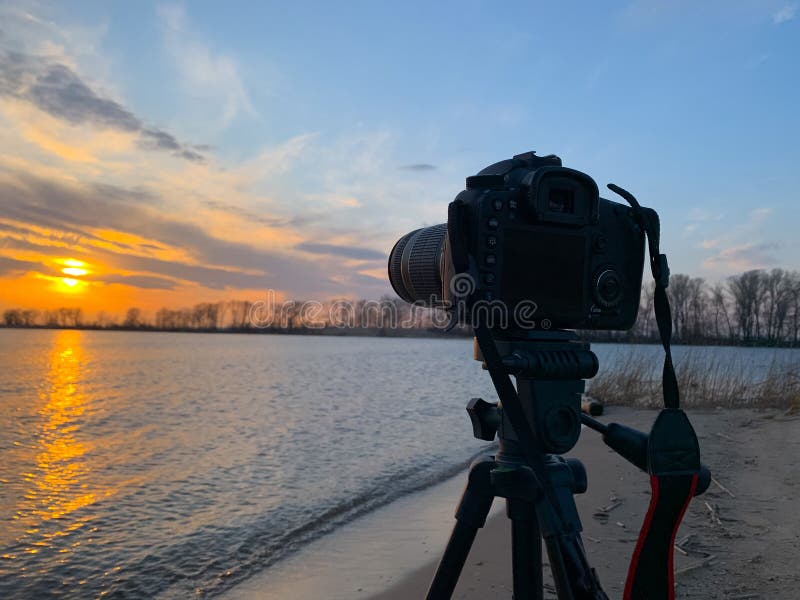 SLR Camera on Sunset Background Stock Photo - Image of camera, beach ...