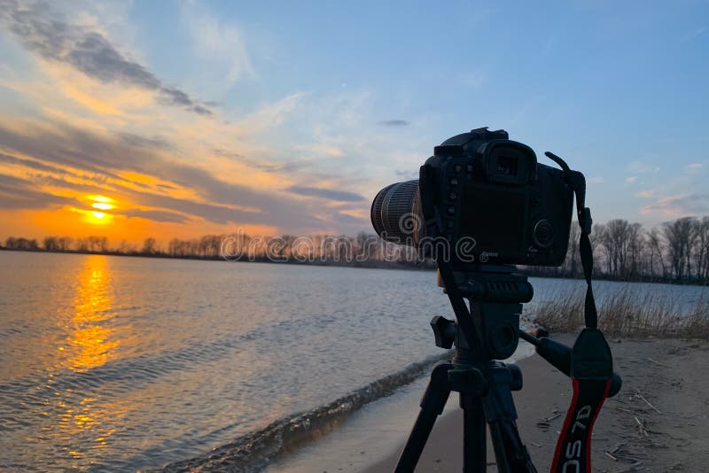 SLR Camera on Sunset Background Stock Photo - Image of optical, lens ...