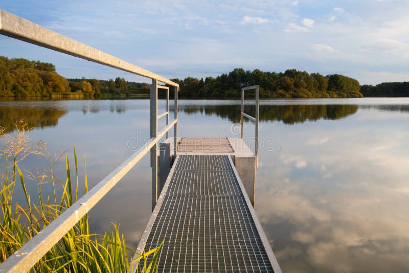 Sluice gate on the pond stock photo. Image of autumn - 64107440