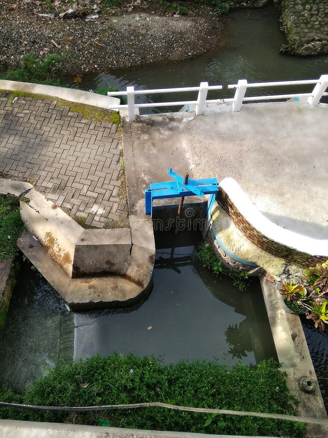Sluice Gates in Small Irrigation Stock Image - Image of water, boat ...