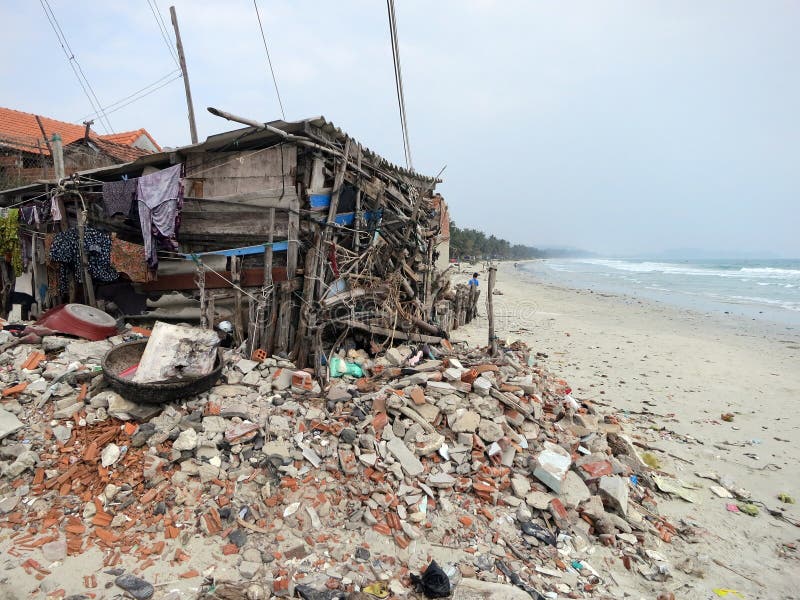 Slum on the coast stock image. Image of barn, beach, home - 46382211