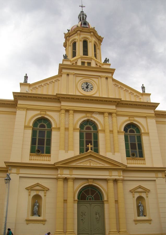 Neoclassical Church Facade Features a Symmetrical Design with Cream ...