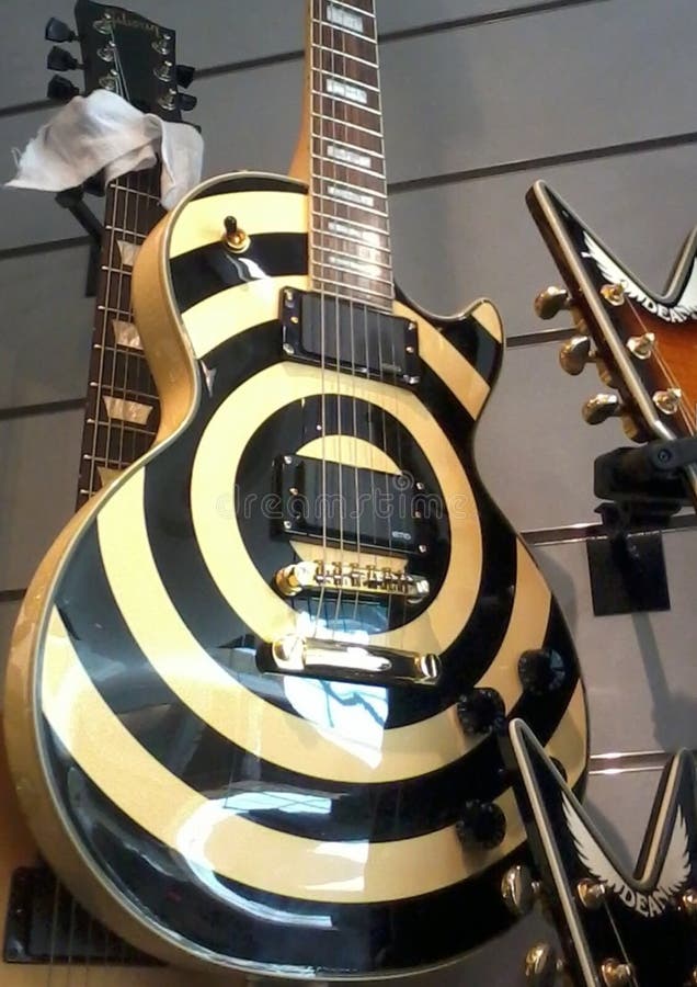 Electric Guitar with a Striking Yellow and Black Spiral Pattern ...