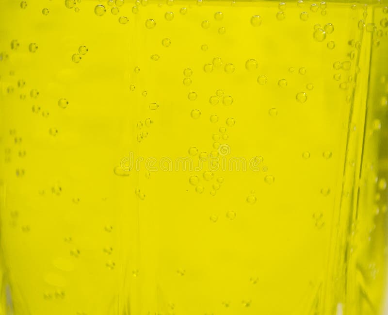 Small Air Bubbles in the Liquid Stock Photo - Image of liquid, golden ...