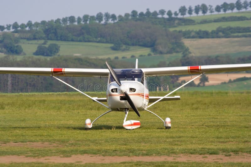 Small aircraft on airfield stock image. Image of crew - 1340935