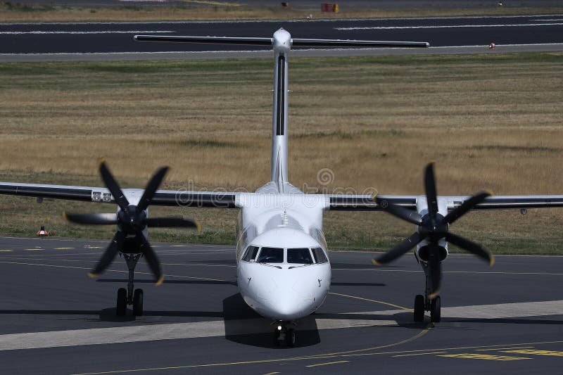 Small Jet on the Runway, Front Close-up View Stock Photo - Image of ...