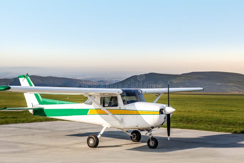 Small aircraft on runway . stock image. Image of airplane - 169417847