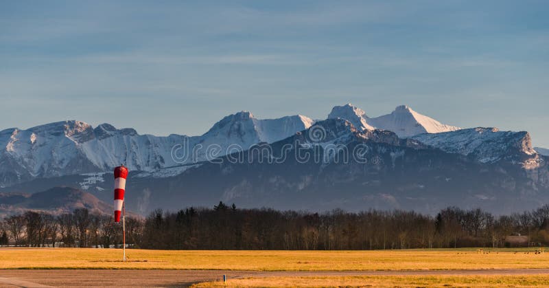 Small Airfield in Front of Mountain Top. Sunset Over Mountains. Stock ...