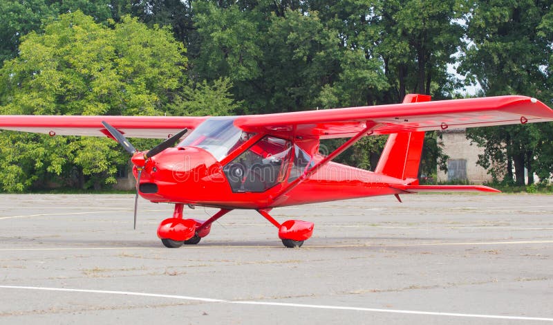 Small Airplane in Dirt Airfield Stock Image - Image of blue, airplane ...