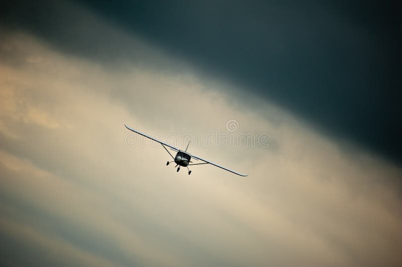 Airplane over the clouds stock image. Image of aircraft - 41336993