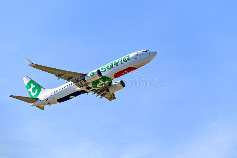 Small Airplane Flying in a Cloudy Blue Sky Editorial Photography ...
