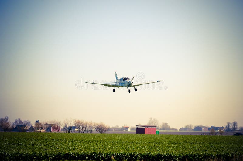 Small airplane flying stock photo. Image of sunrise, aviator - 39721148