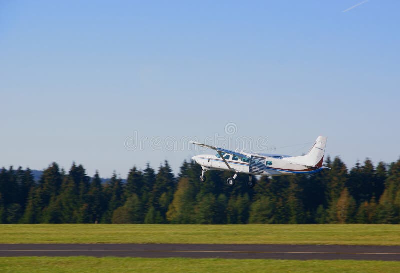 Small airplane lifting off stock image. Image of plane - 21626873