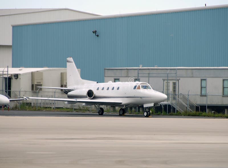 Small airplane parked stock image. Image of luxury, jetliner - 4732273