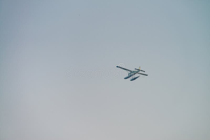 Small airplane in the sky stock image. Image of canada - 299448491