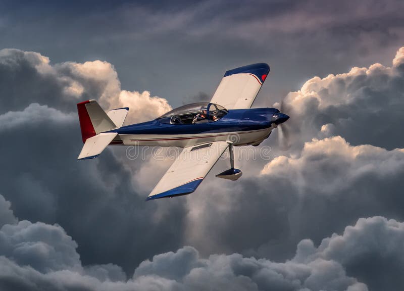 A Small Airplane in the Sky Against Dramatic Clouds Editorial Photo ...