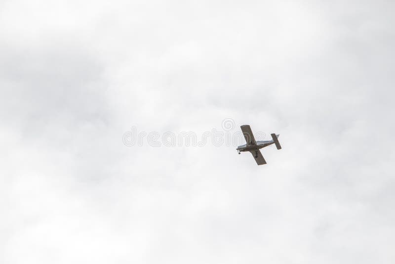 Small airplane in sky editorial photo. Image of clouds - 172942101