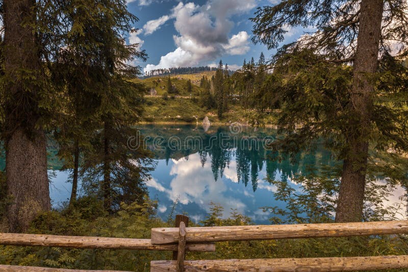 Small Alpine Lake in the Dolomites Stock Image - Image of alpine, snow ...