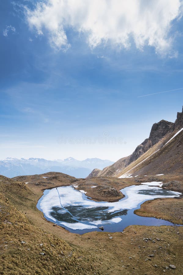 Small Alpine Lake at the Thaw Stock Image - Image of alpine ...