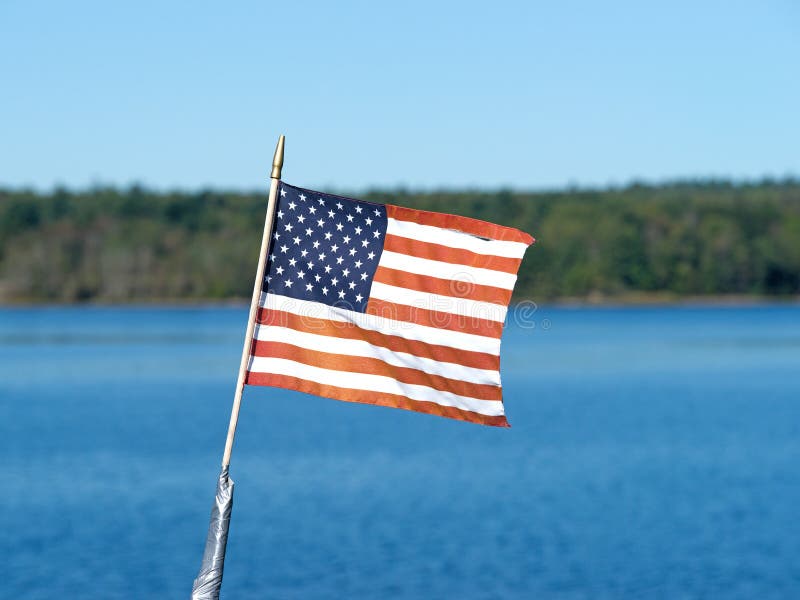 Small American Flag With Ocean And Shore Stock Photo - Image of flag ...