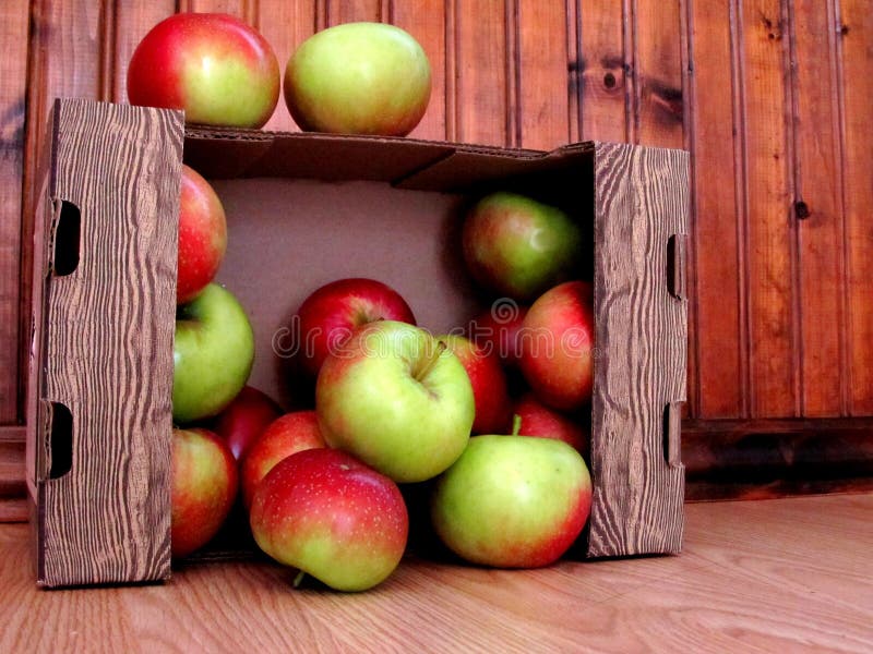 A little box of apples stock image. Image of alimentation - 141717133
