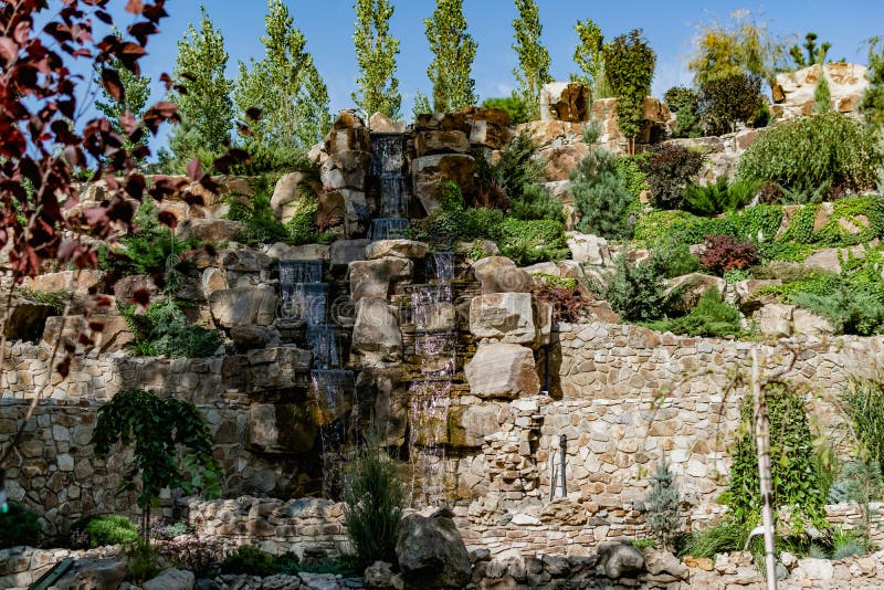 A Small Artificial Freshwater Waterfall that Flows into a Common Living ...