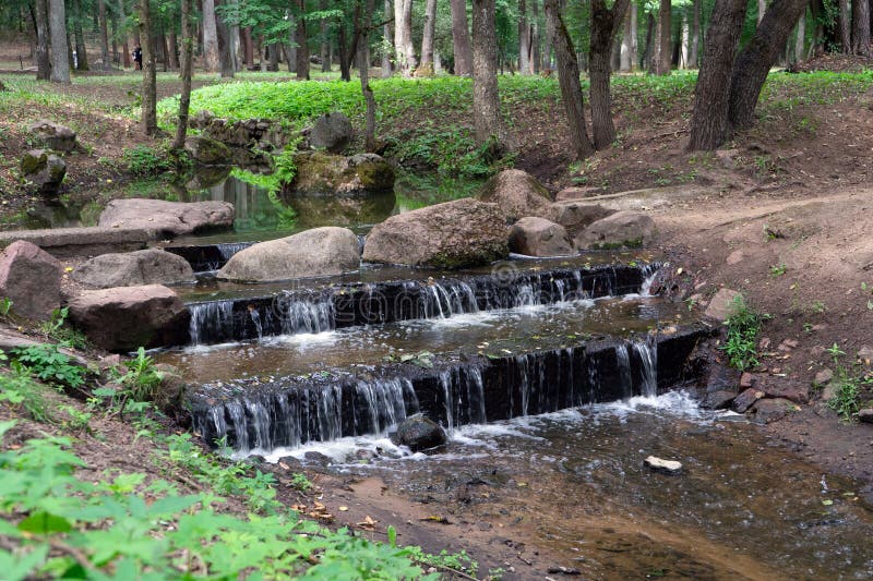 A Small Artificial Waterfall on a Stream in a City Park. Minsk, Belarus ...