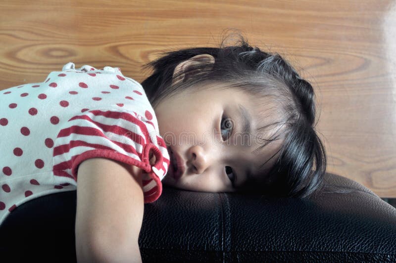 Small Asian Child Feel Lonely in Sofa Stock Photo - Image of people ...