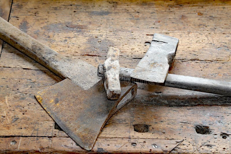 Small Axe and Big Hammer on the Old Wooden Workbench Stock Photo ...