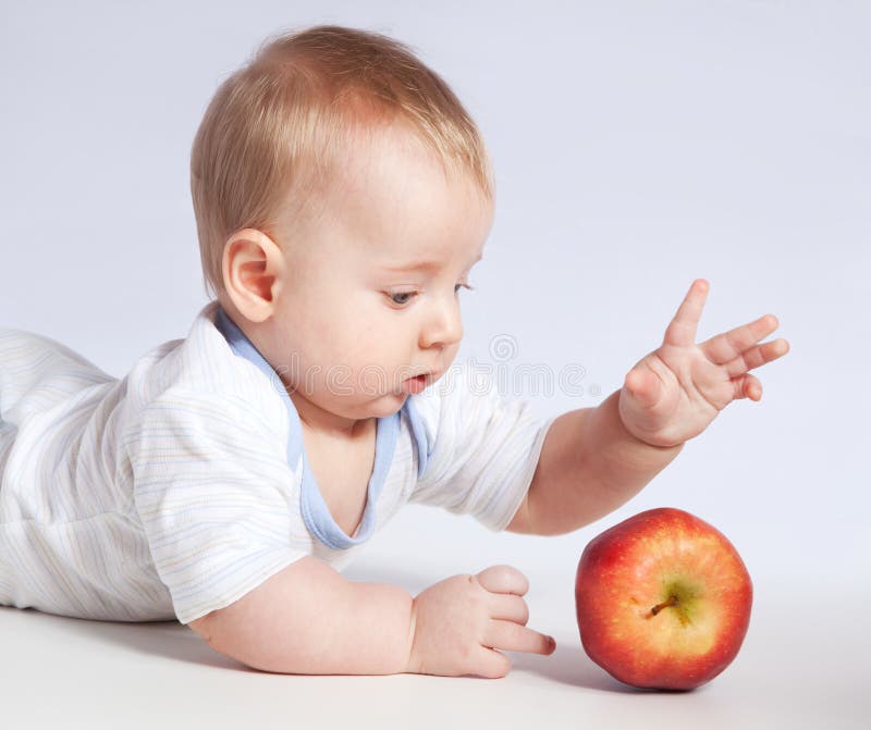 Small baby with apples stock photo. Image of happy, shot - 23449154