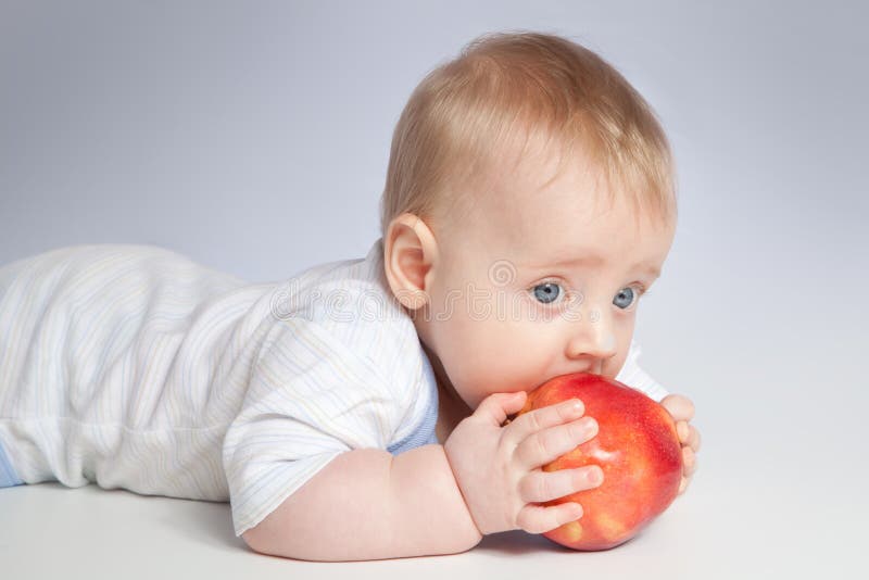 Small baby with apples stock image. Image of cute, baby - 23785999