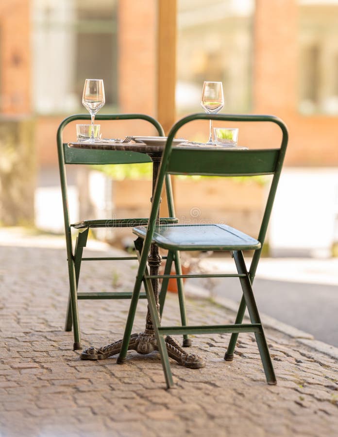 Small Backyard Restaurant Table with Two Chairs.. Stock Photo - Image ...