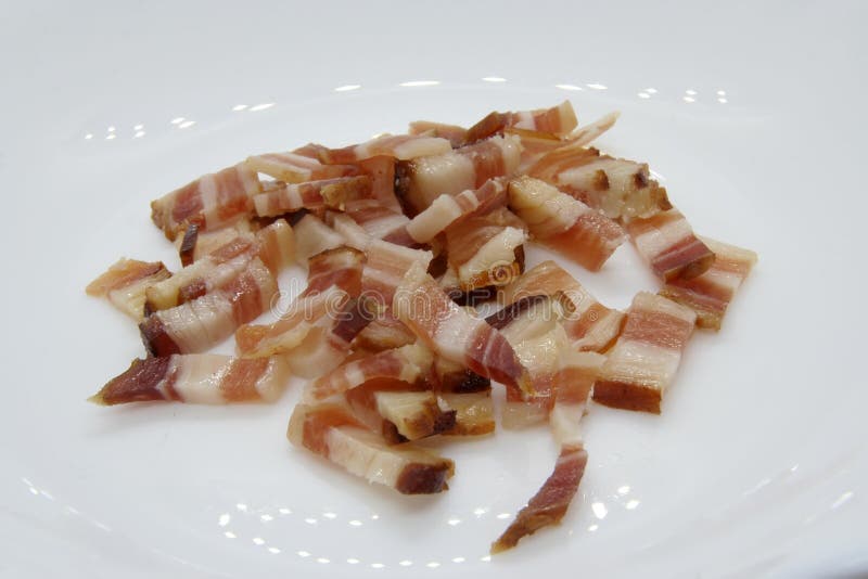 Small Bacon Slices. Smoked Bacon Slices. Small Bacon Cubes Stock Image ...
