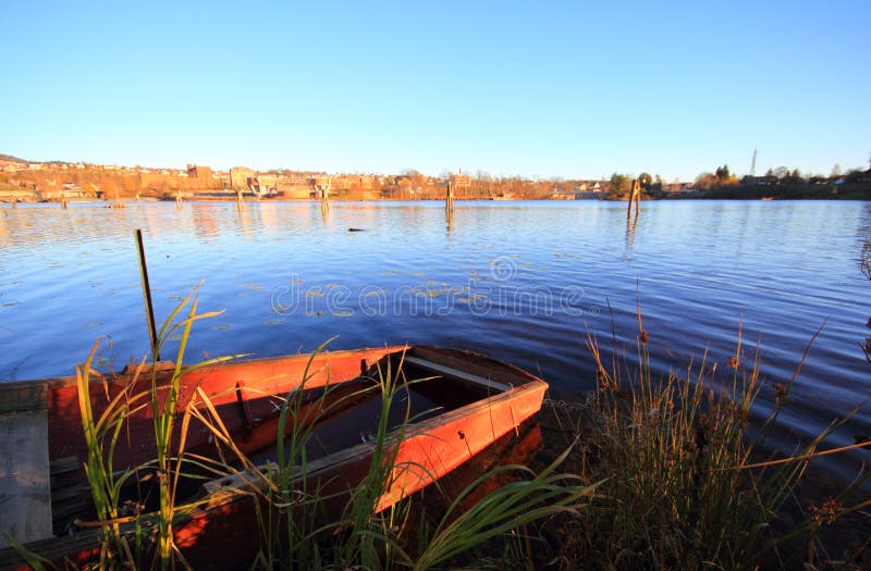 Small barge in the lake. stock photo. Image of sunset - 19004892