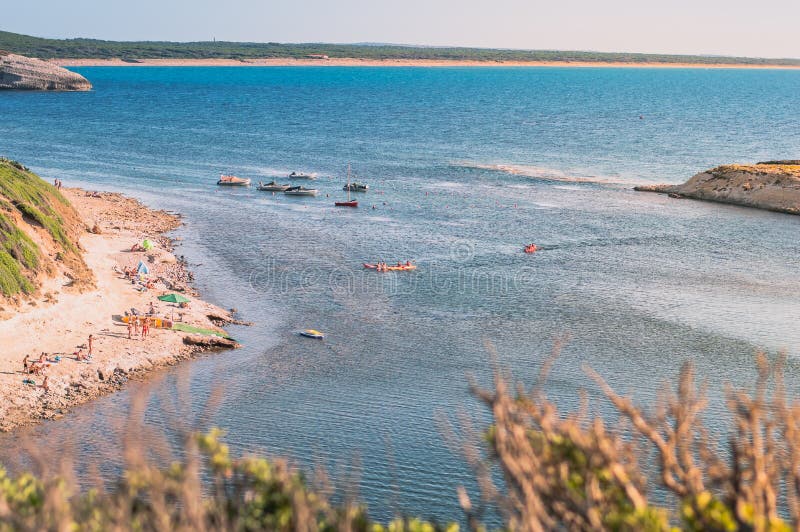 Small Bay with a Beach and Boats in the North of Sardinia Stock Photo ...