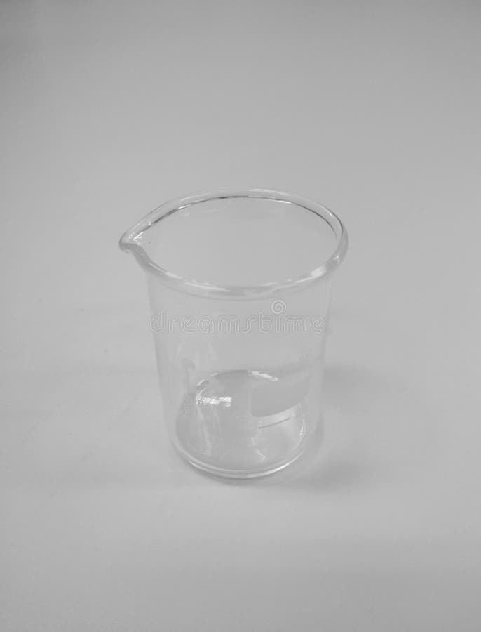 Beaker with a Small Bouquet of Wildflowers. Stock Image - Image of ...