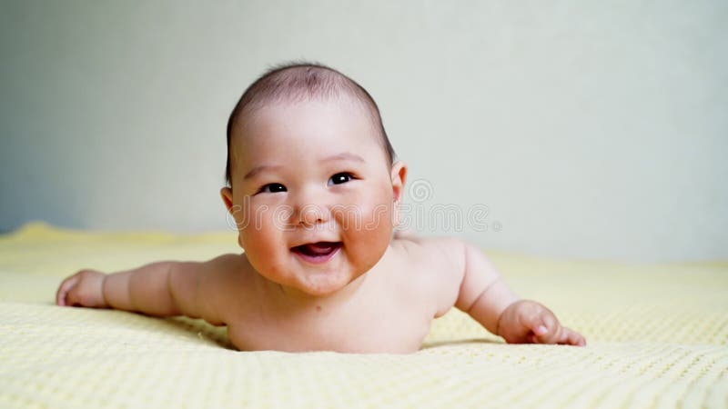 A Small Beautiful Child is Sitting in a Bathing Circle Stock Video ...
