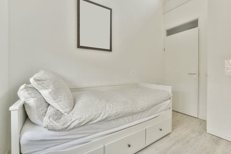 A Small Bedroom with a Single Bed Stock Photo - Image of soft, cozy ...