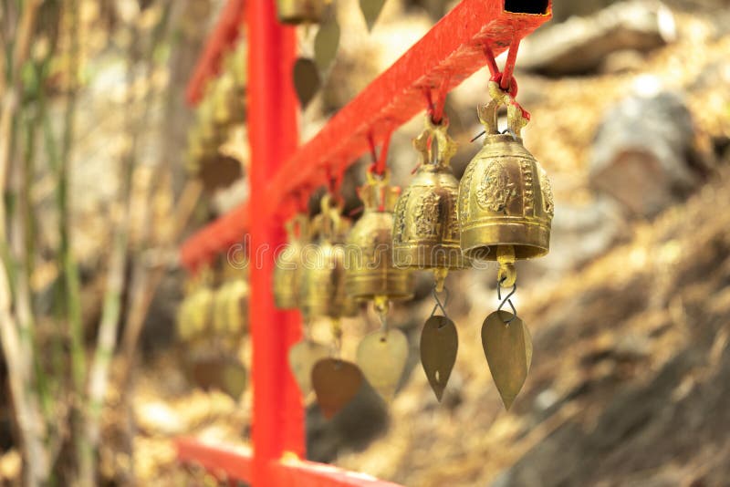 Small Bell Hanging in a Row Stock Photo - Image of entrance, people ...