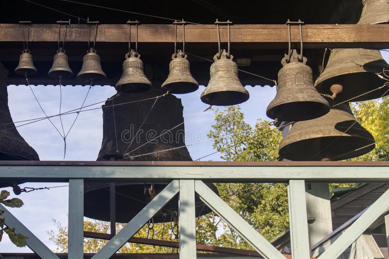 Small Bells with Patterns, Suspended in a Row in Ascending Order in ...