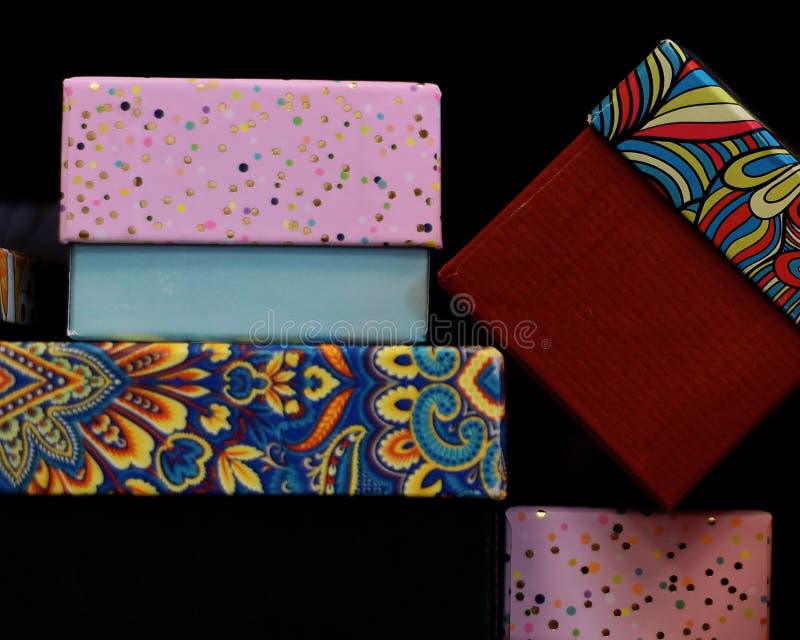 Gift Small and Big Decorative Bright Boxes on a Black Background Stock ...