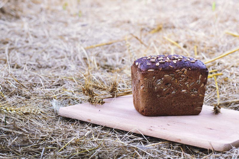 Small Black Grain Bread Outdoors Stock Photo - Image of wheat ...