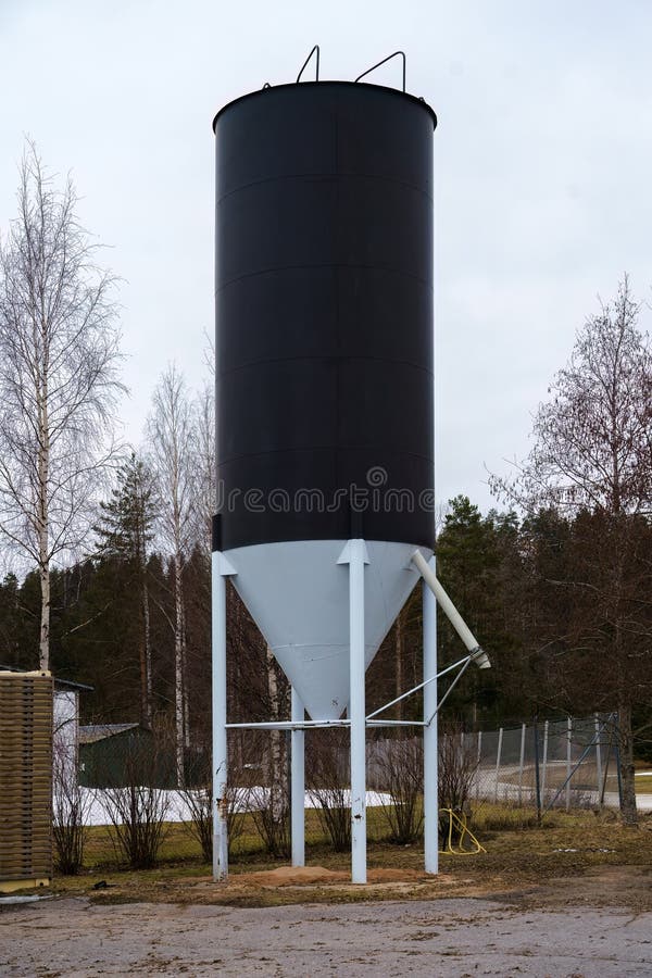 Small black metallic silo stock photo. Image of fence - 317528834