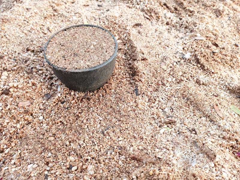 Small Black Pot with Full of Sand on Sand Stock Image - Image of ground ...