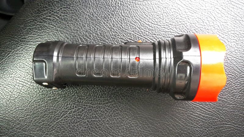 Small Black and Red Flashlight Stock Photo - Image of metal, engine ...