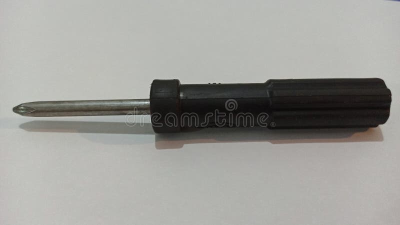 A small black screwdriver stock image. Image of iron - 245212869