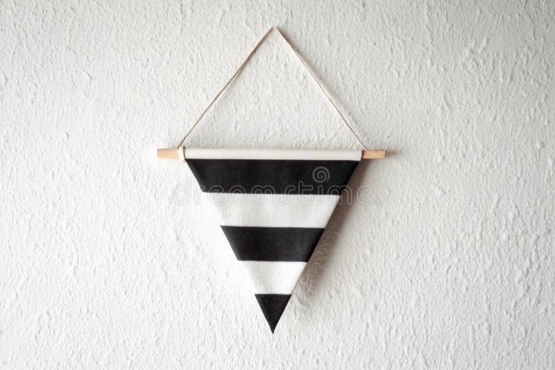 Small Black White Triangle Shape Flag Hanging Curve Down Plaster Wall ...